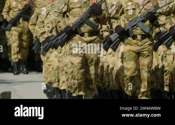 March military officers with assault rifle kalashnikov ak 47 in arm ...