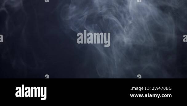 Abstract white smoke in slow motion. Smoke, Cloud of cold fog in light ...