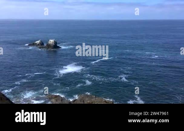 Stunning ocean views, panning to show Seal Rock, tide pools, cliffs ...