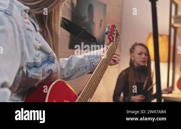 Midsection slowmo of unrecognizable girl in denim jacket adjusting ...