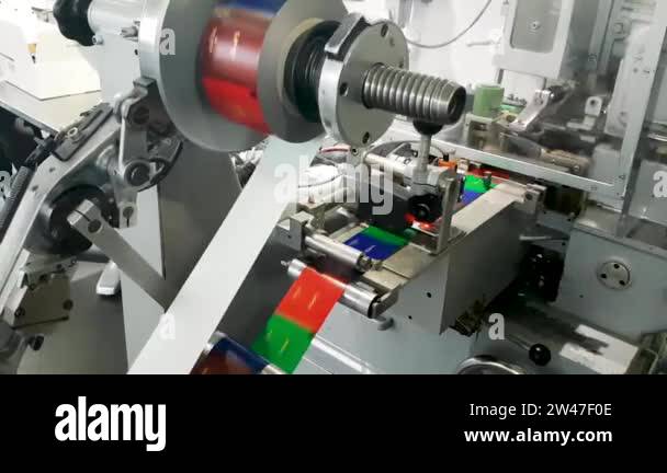 Koln, Cologne / Germany - 2017: Machine printing colorful candy ...