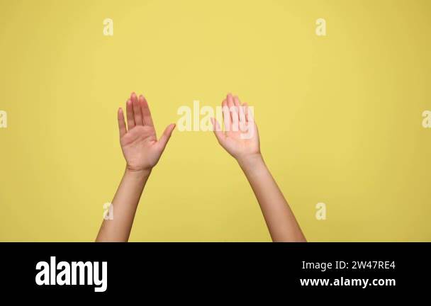 two arms are spinning around, tilting, clapping, rubbing each other and ...