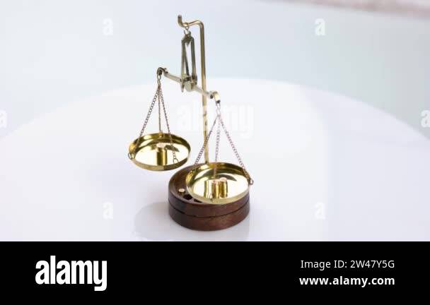 Golden scales Stock Videos & Footage - HD and 4K Video Clips - Alamy