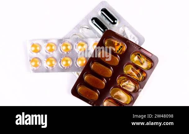 Medicines in pills rotate in a circle. First aid medical pills ...