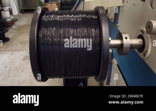 Bobbin winding machine. Detail from a spool with plastic filament Stock ...