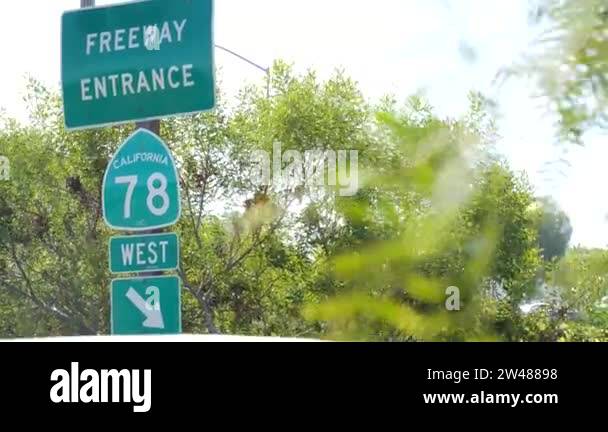 Freeway entrance sign on interchange crossraod in San Diego county ...
