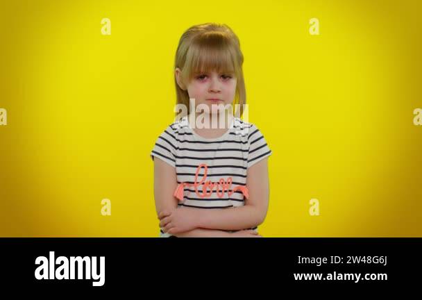 Upset disappointed kid child girl with tears on eyes cries from despair ...