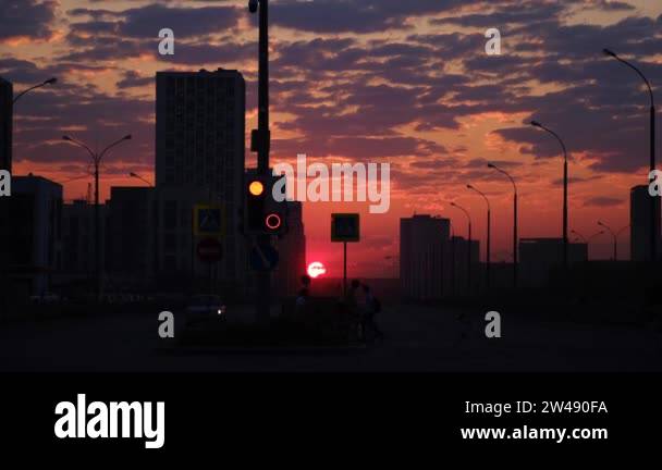 Early morning sunrise in a city street. Concept. Breathtaking pink and ...