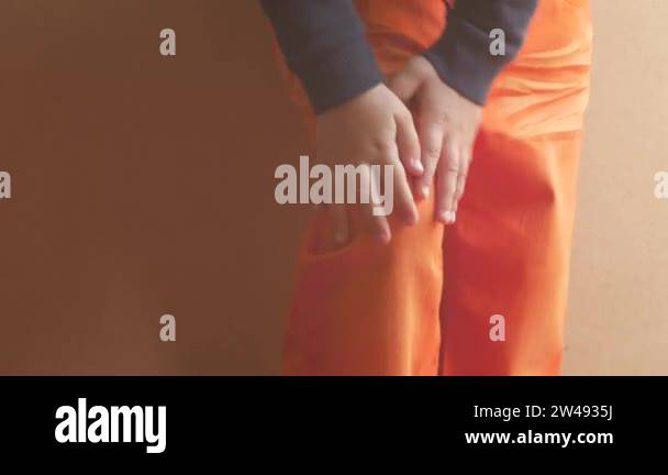 Knee pain, health care concept. Child massaging painful leg. Kids joint ...