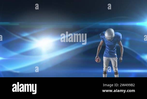 Animation of excited american football player holding ball on dark ...