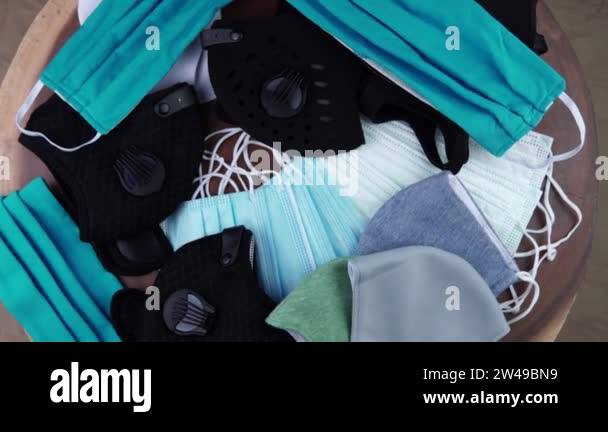 Pile of medical and dust pollution face masks. Mandatory face masks by ...