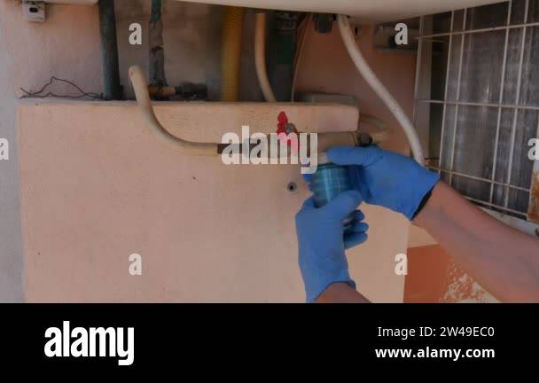 cleaning and disassembly and filling of a boiler anti-limescale dosing ...