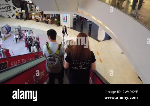 19 JULY 2020, METROPOLIS SHOPPING CENTER, MOSCOW, RUSSIA: Walking through the mall, people walk ...