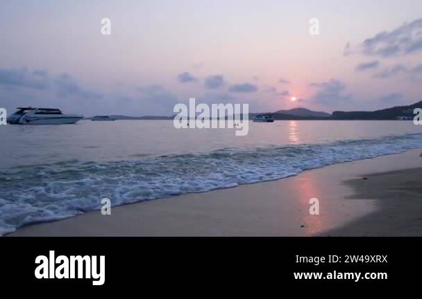 Amazing sunrise over the tropical beach. Yellow sun over sea. Orange ...