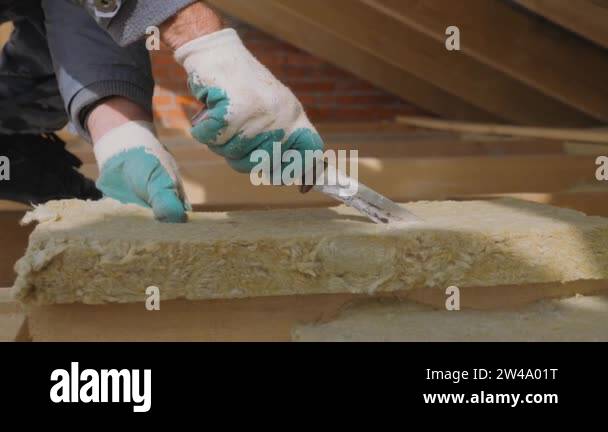 Construction work. Installation of insulation using. Laying of multi ...