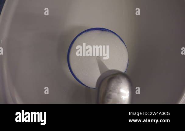 Water flow into blue bucket full of scum froth in bath. 4K Stock Video ...