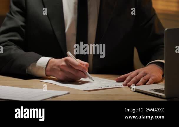 Business man checking and signing by pen a contract. Boss in business ...