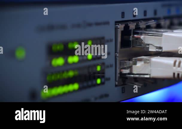Detail of RJ45 Lan cable on network switch in data center. 4K UHD Video ...