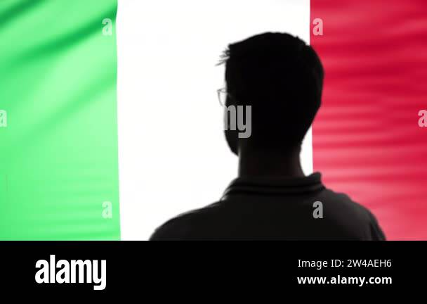 Proud saluting male on Italian flag background Stock Video Footage - Alamy