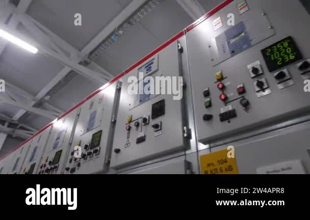 Row of switchboards with buttons and screens at substation Stock Video ...
