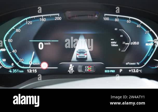 Close-up of an electric car dashboard display. Green energy zero ...