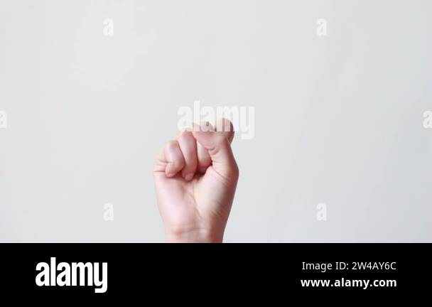 Female one hand holding two fingers up in sign language.two fingers up ...