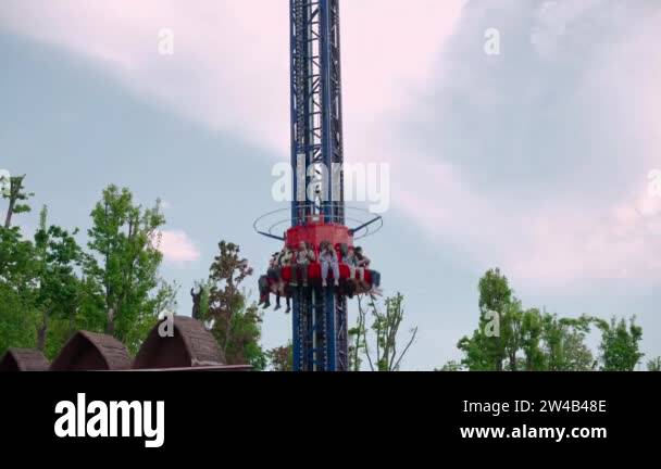 Ukraine, Kharkov May 2021 Drop tower ride with exciting people on the ...