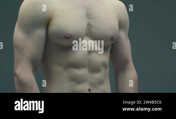 Close up 4K video of male athlete with pumped up torso muscles. Athlete ...