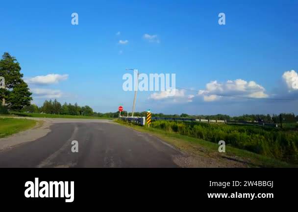 Driving Turning Around Road Bend Corner Approaching Rural Stop Sign ...