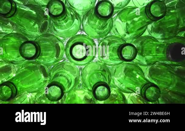 Empty bottles. Slider shot of empty glass bottles. Top view in ...