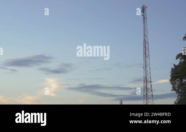 Telecommunication tower 5G with radio antennas in a green environment ...