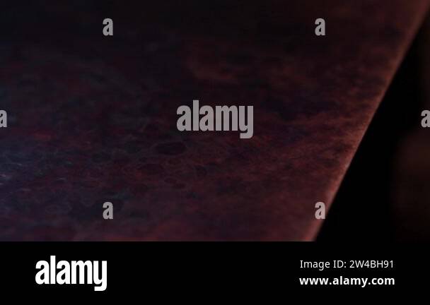 Copper. Metal plates. Drops of water are sprayed onto copper coating ...