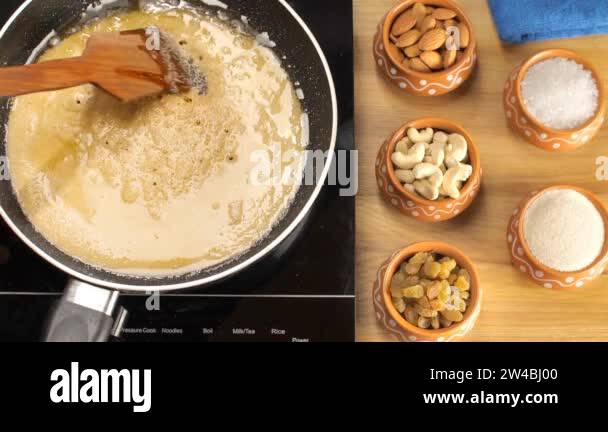 "Frying Sooji/semolina in homemade Ghee to make delicious Halwa - food ...