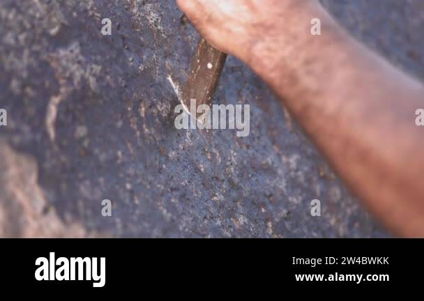 Ancient man cave painting and writing historic inscription graffiti on ...