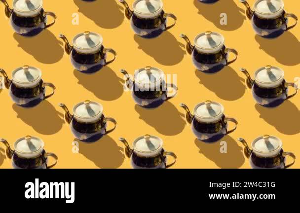 Background from large group of old teapots. Stop motion animation ...