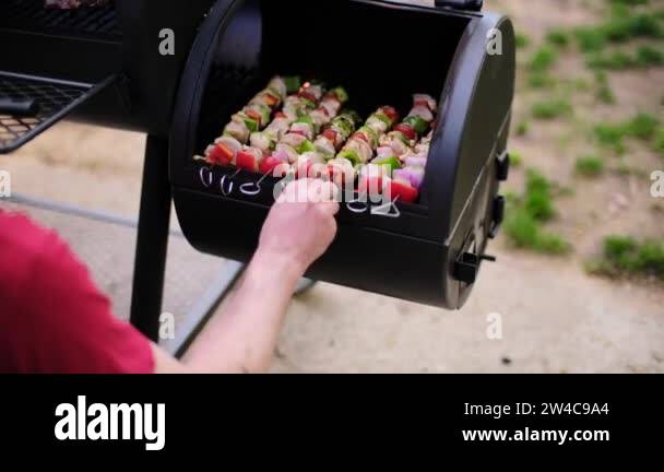 Bbq smoker grill Stock Videos & Footage - HD and 4K Video Clips - Alamy