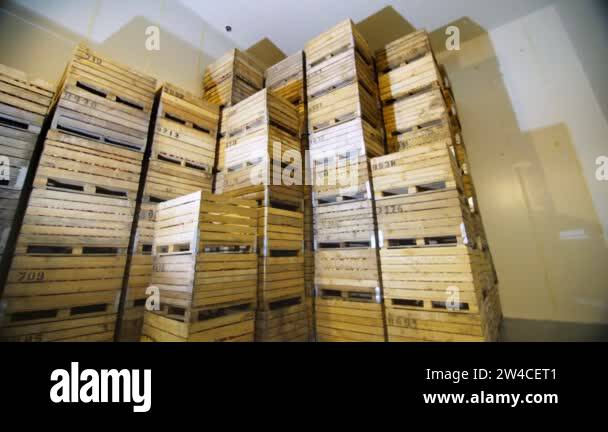 apple storage. warehouse. stacks of wooden crates for fruit, boxes with ...
