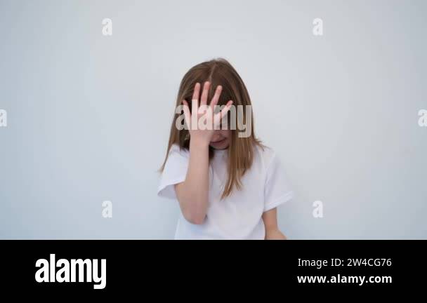 Facepalm gesture made by little girl Stock Video Footage - Alamy