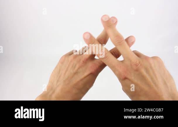 two hands cross fingers in sign of prison or cage or jail, and approach ...