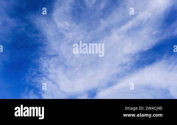 Blue sky and white clouds 4k resolution time lapse. Building motions clouds. Puffy fluffy white ...