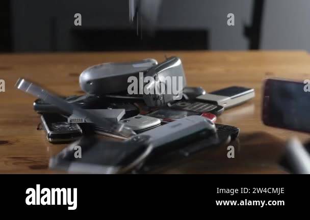 Pile mobile phones on table Stock Videos & Footage - HD and 4K Video ...