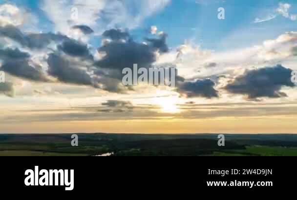 Beautiful evening sunset, time lapse, movement of clouds of a different ...