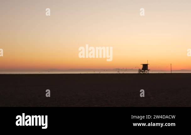 Summertime travel concept. Dark silhouette, iconic retro wooden ...