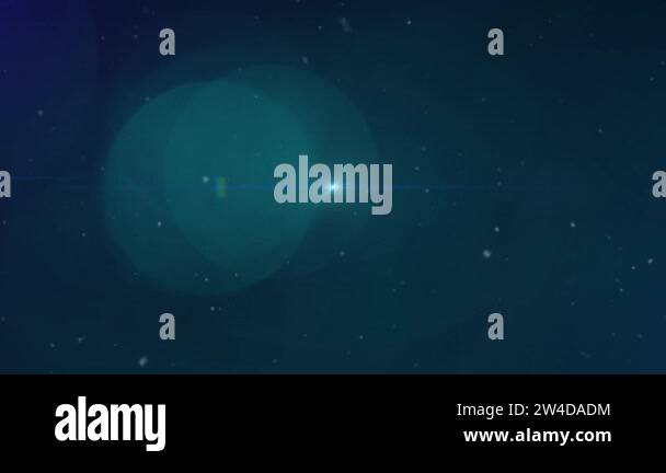 Animation of glowing green spots of bokeh light with falling particles and lens flare in ...