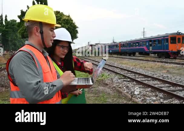 Two engineers working at power plant, helping each other analyze problem Stock Video Footage - Alamy