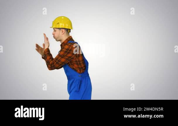 Construction worker willing to work, ready to work He claps hands and ...