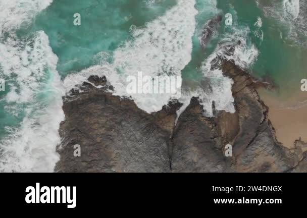 Breaking waves through rocks Stock Videos & Footage - HD and 4K Video ...