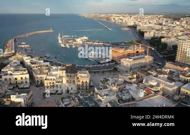 Beautiful panoramic aerial 4K video from flying drone at sunset to Bari ...