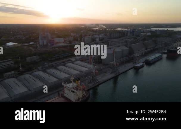 4K modern industrial port with containers from top or bird's eye view ...