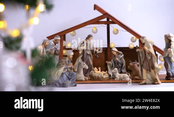 Jesus Christ Nativity scene near Christmas tree. Jesus Christ birth in ...
